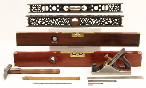 Two Cast Iron Antique Tools