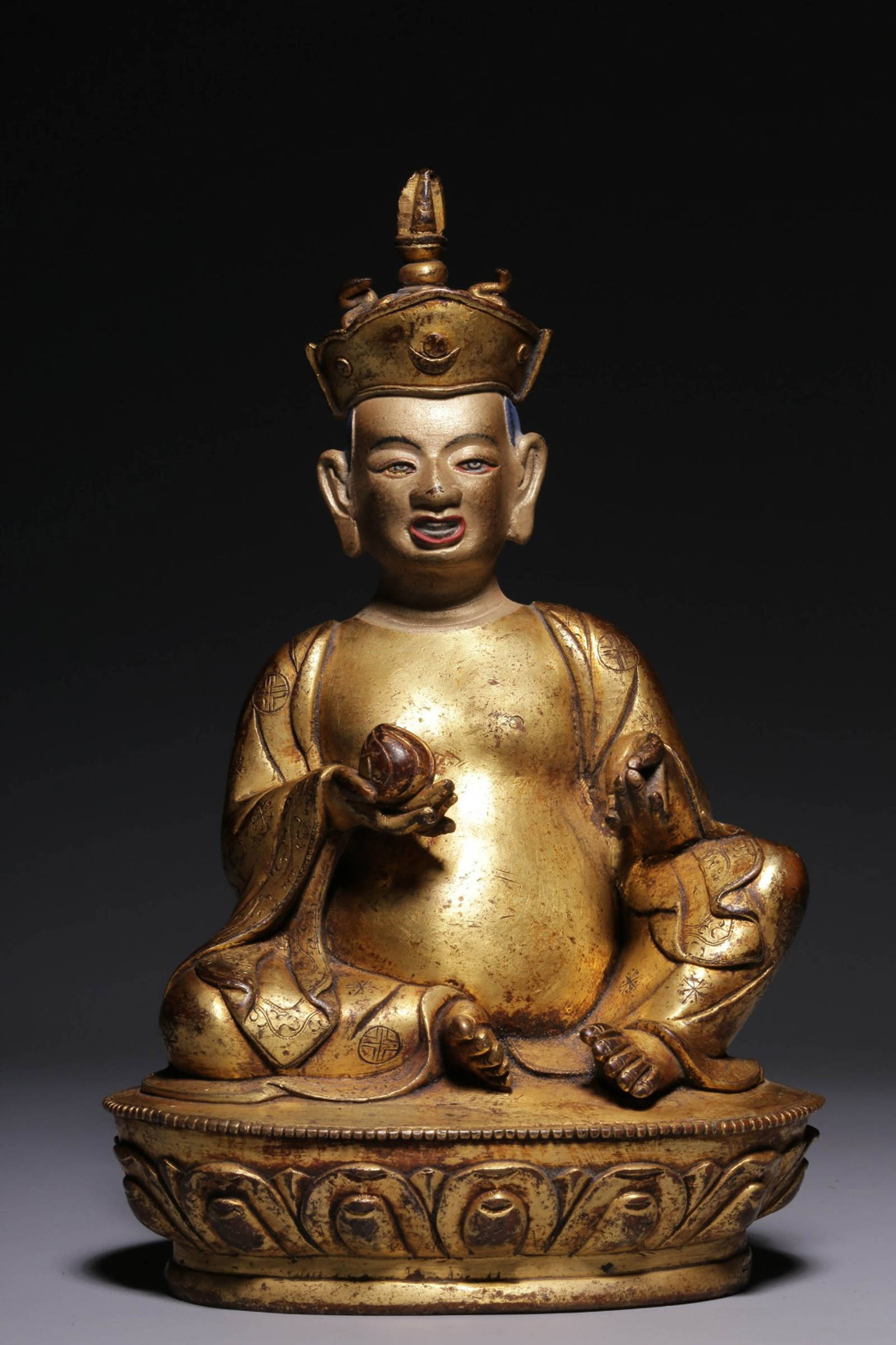 A Gilt Bronze Figure Of A Seated Master, Qing Dynasty Auction