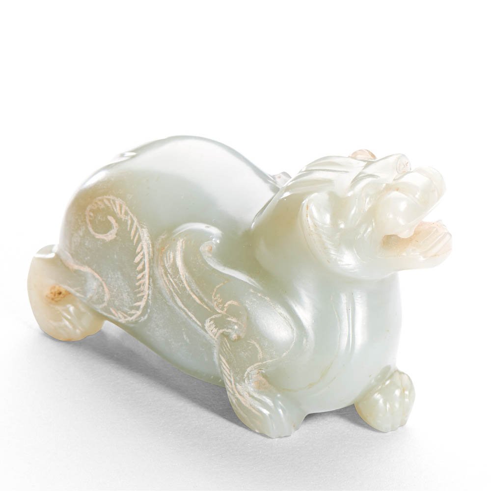 A CHINESE WHITE JADE MYTHICAL BEAST, BIXIE