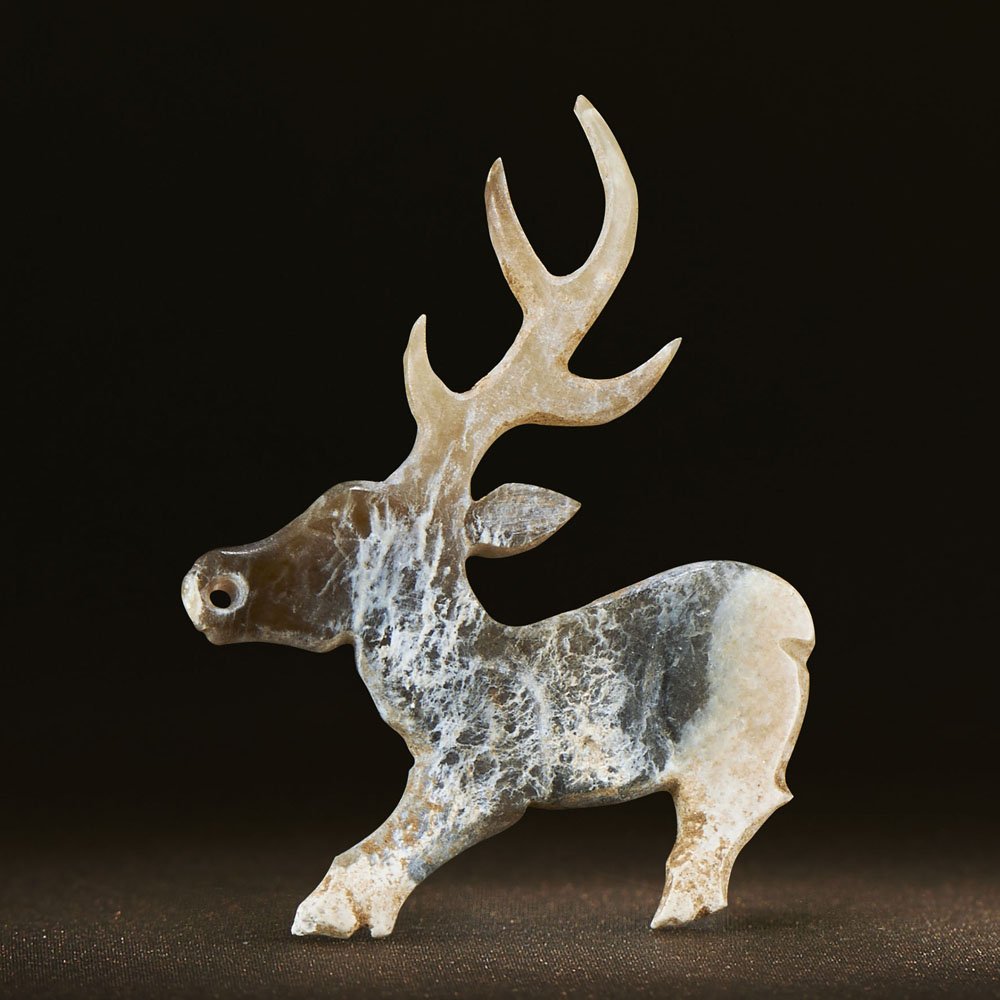A CHINESE UNEARTHED JADE DEER