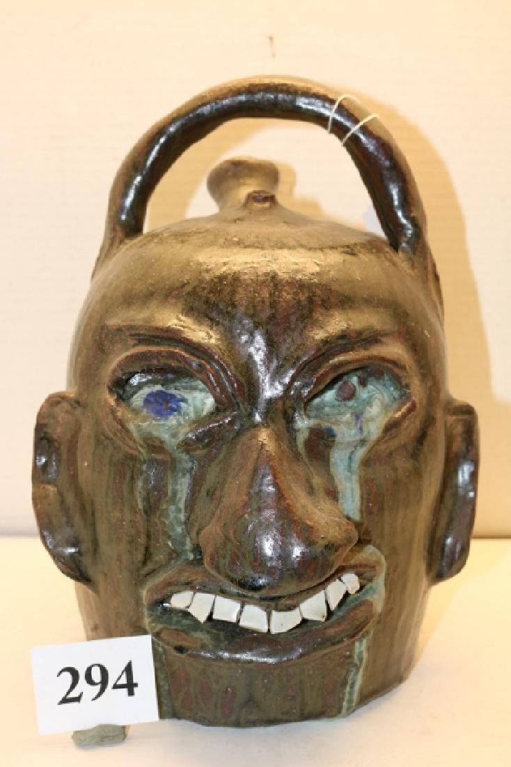 10 3/4" Grotesque Face Jug