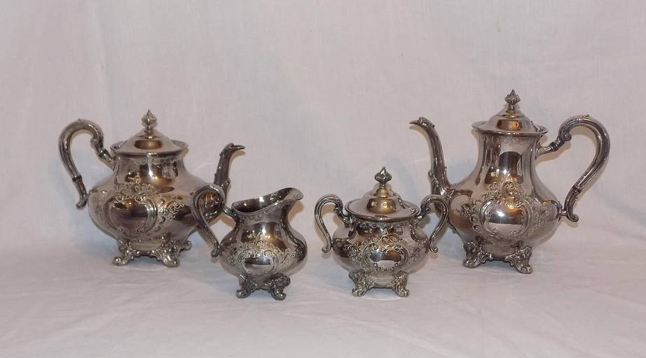 Fancy Four Piece Antique Silverplate Tea Set