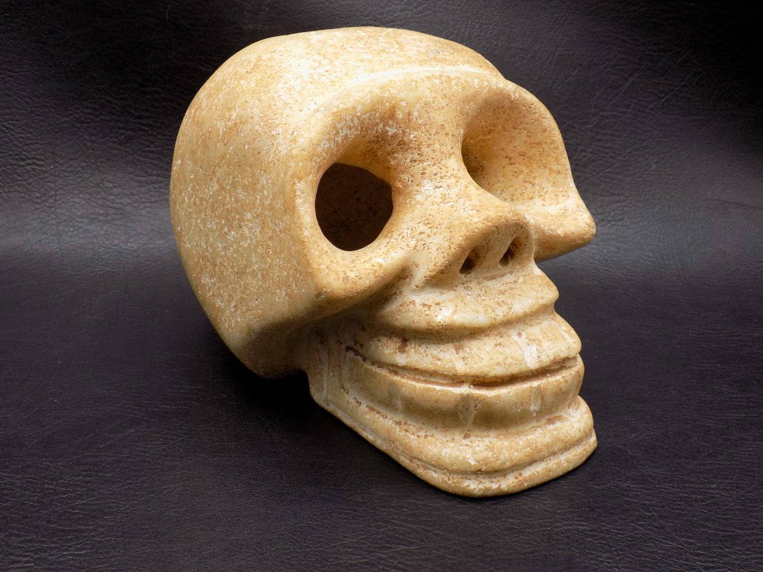 Unusual Large Vintaged Carved Stone Skull. Auction