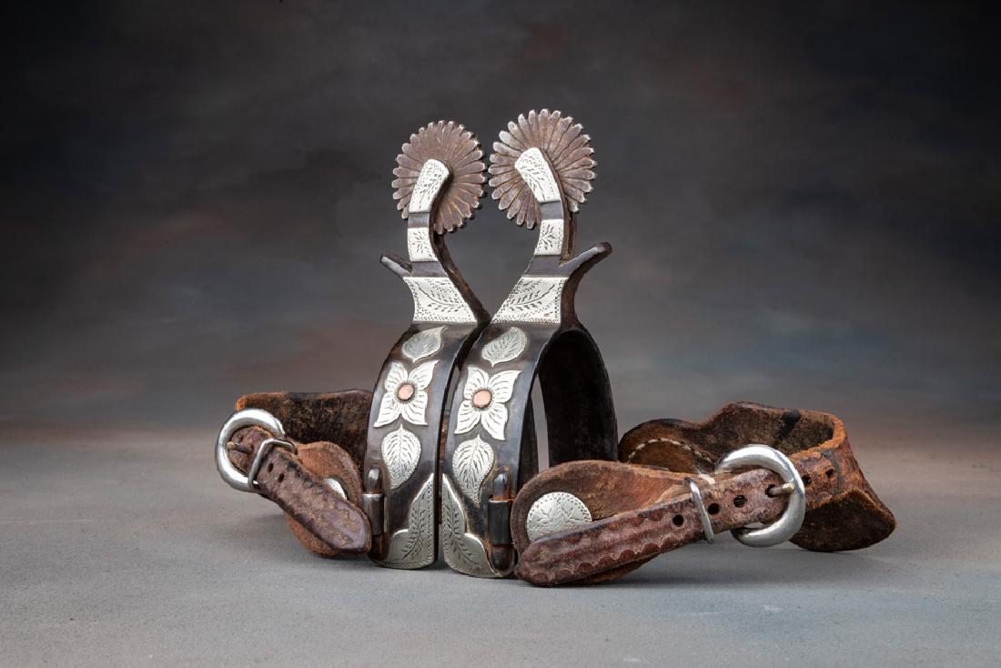 Fancy pair of double mounted Spurs by the late Texas
