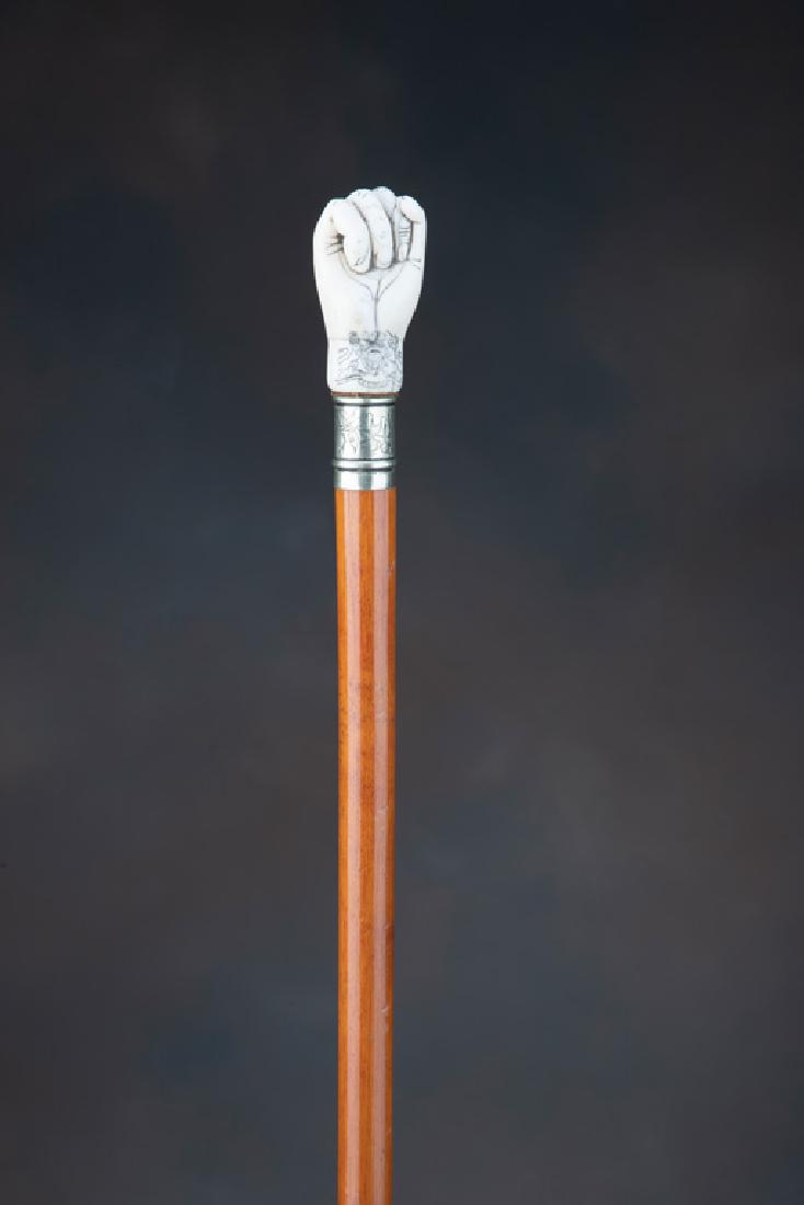 Antique Cane with steel spear point, and carved fist