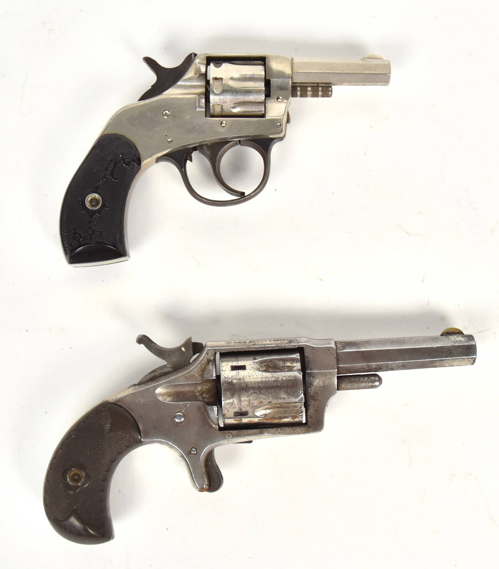 Two Tip Up Revolvers Auction