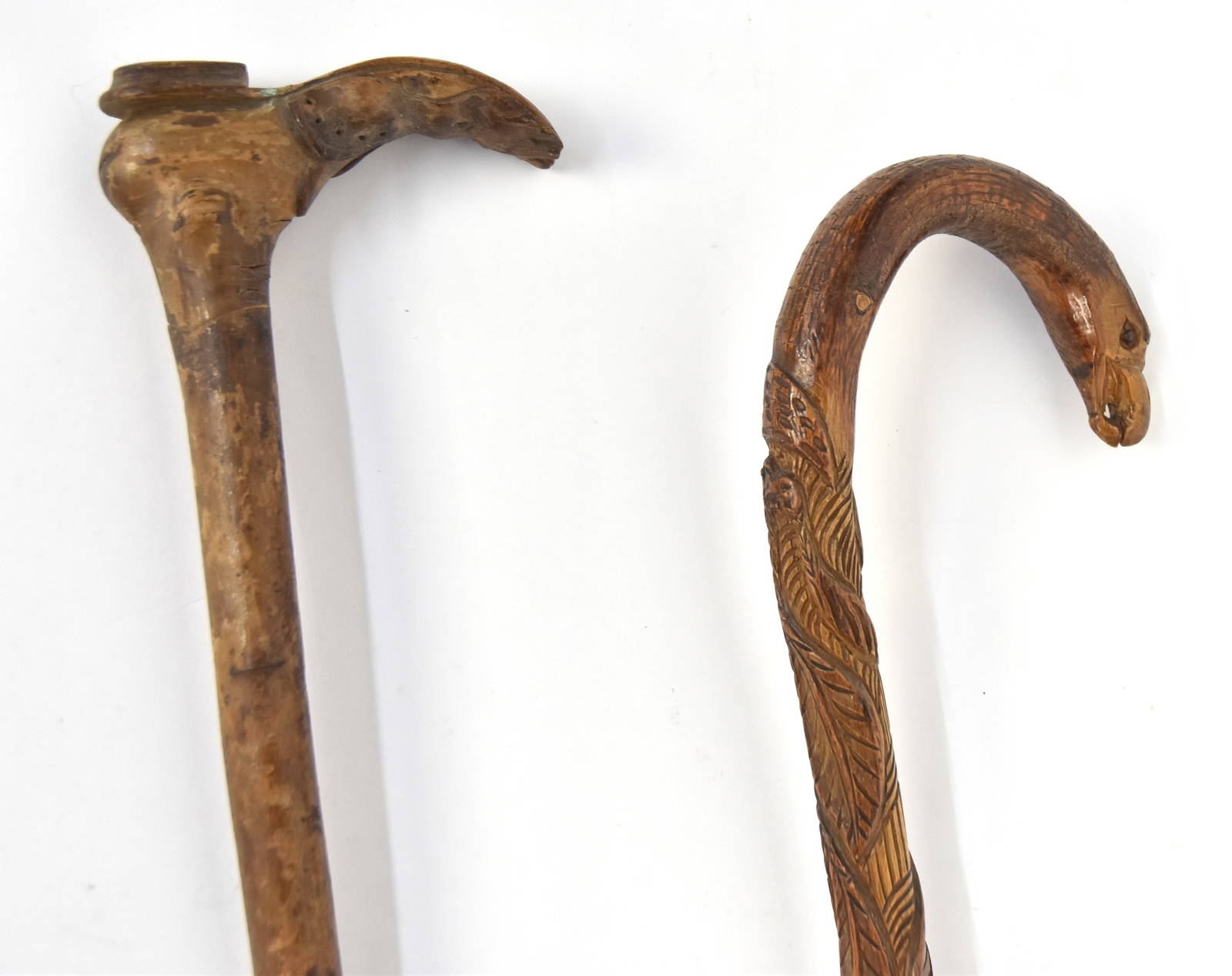 Two Carved Folk Art Canes Auction