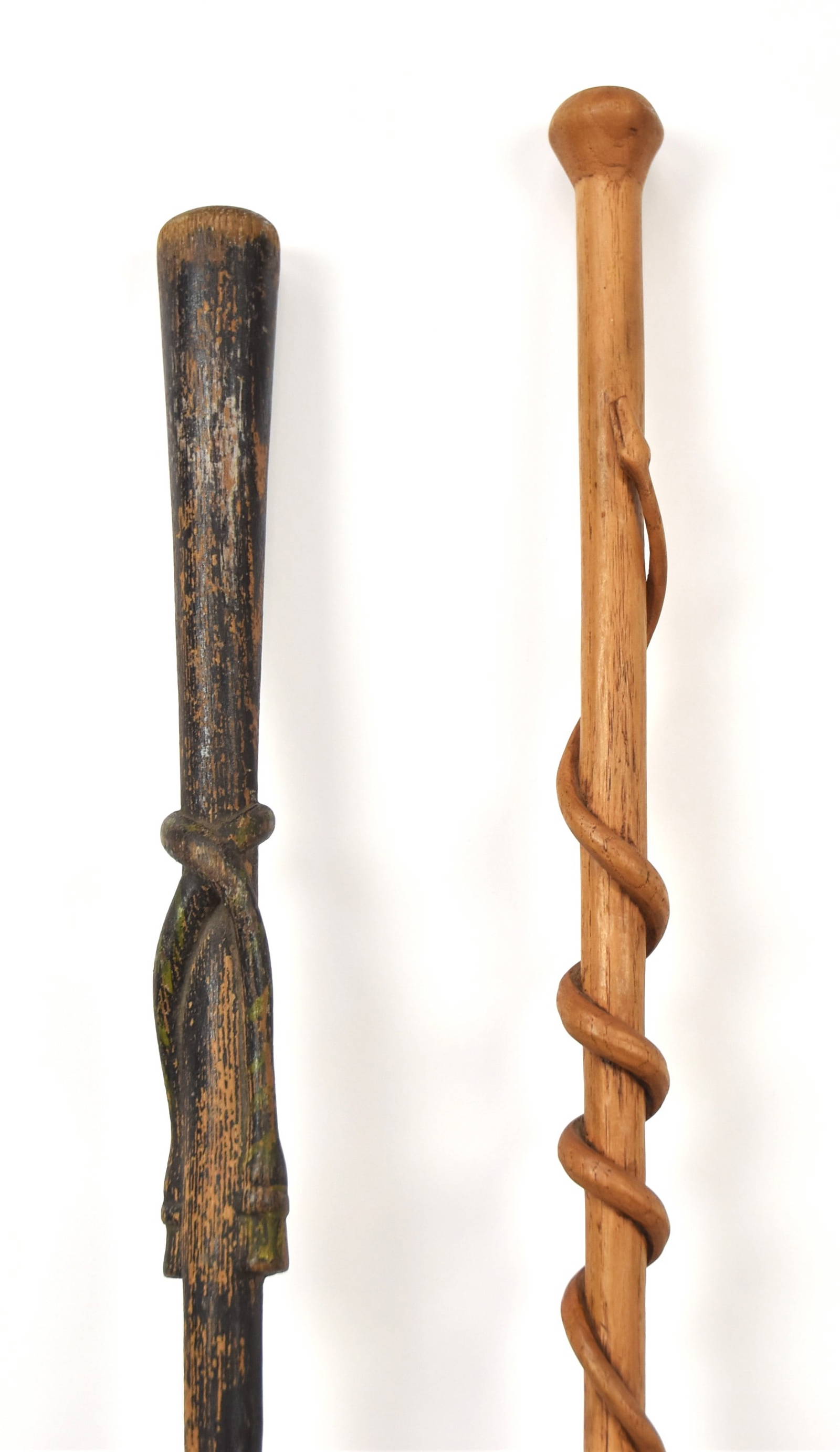 Two Carved Folk Art Walking Sticks Auction