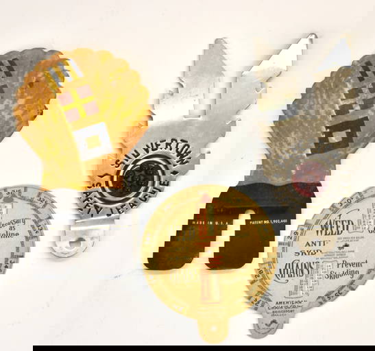 Two License Plate Toppers Plus Price Scale