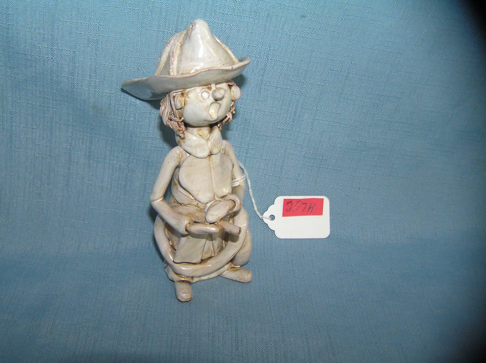 Artist Signed Hand Glazed Clay Fireman Figure Auction