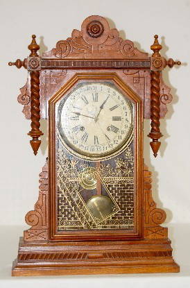 Waterbury Walnut "buffalo" Calendar Clock