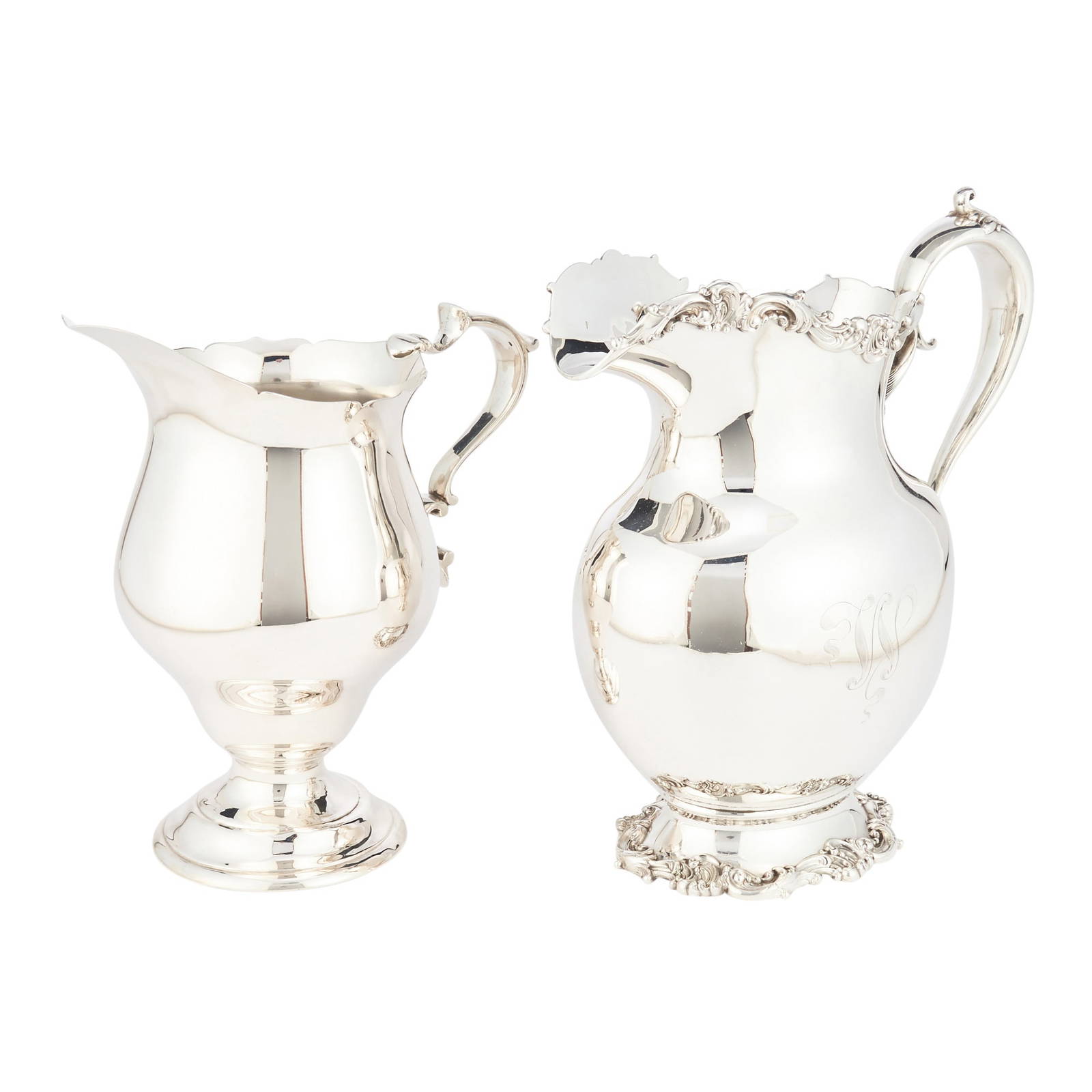 Two American Sterling Silver Water Pitchers Auction