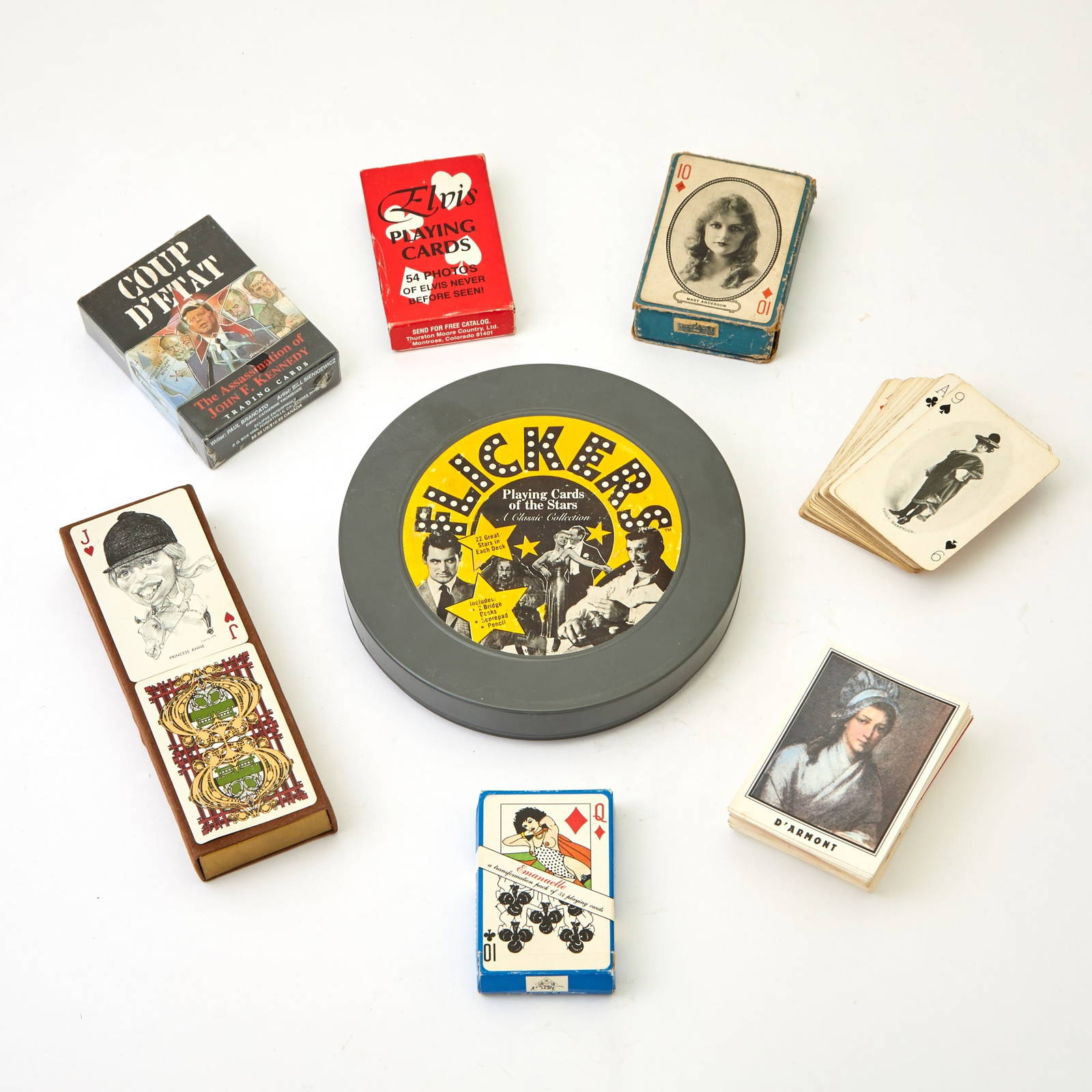 A Group Of Nine Entertainment And Political-themed Playing Cards Auction