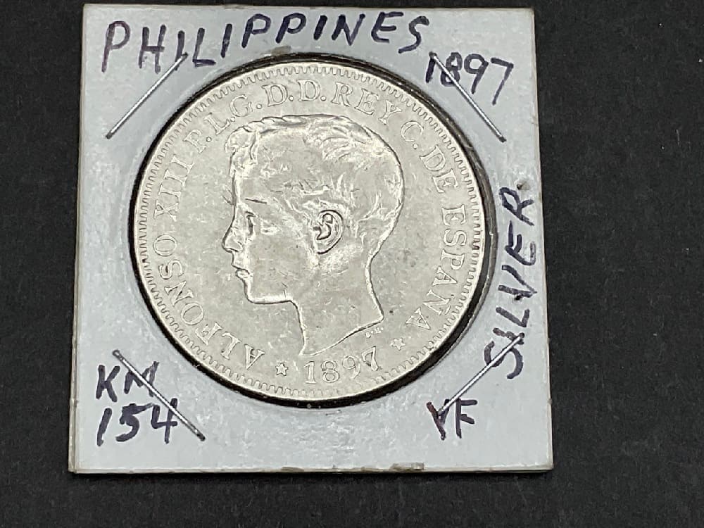 Philippines 1897 Silver Un Pesos Auction