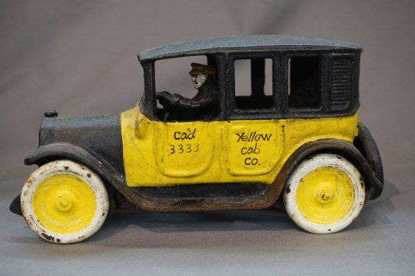 C. 1920 Yellow Taxi Cab Cast Iron Toy By Arcade
