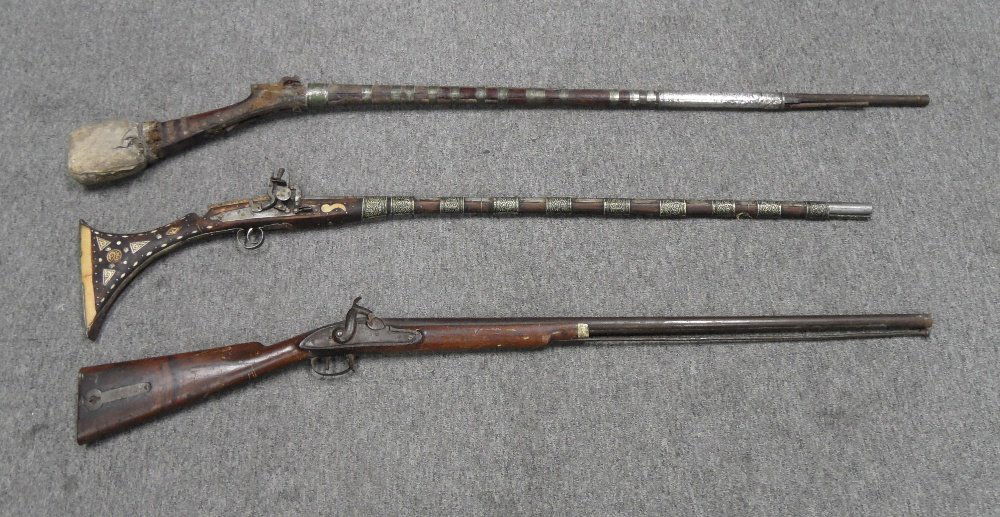 A 22 BORE ARAB SILVER-MOUNTED MATCHLOCK MUSKET, 19TH