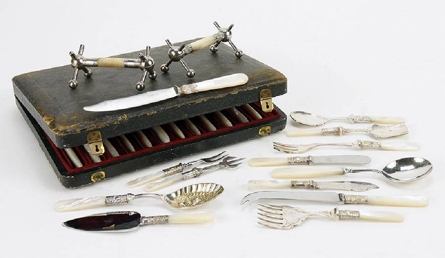 A Collection Of Mother Of Pearl Handled Flatware.