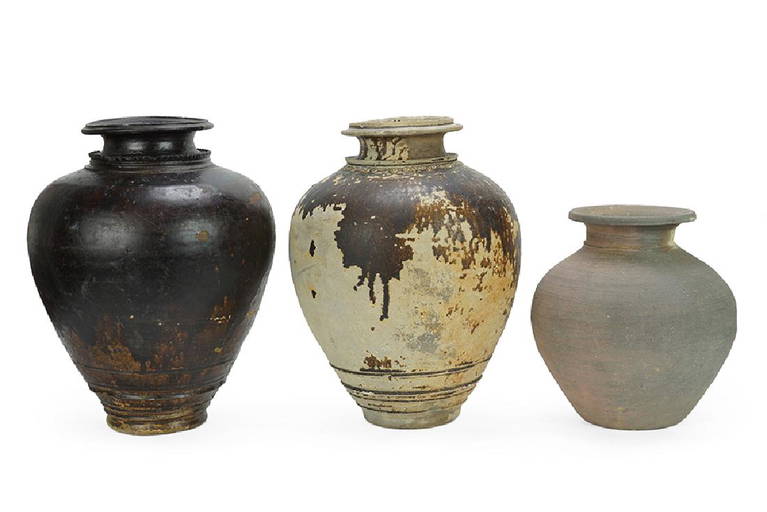 A Group Of South East Asian Pottery.