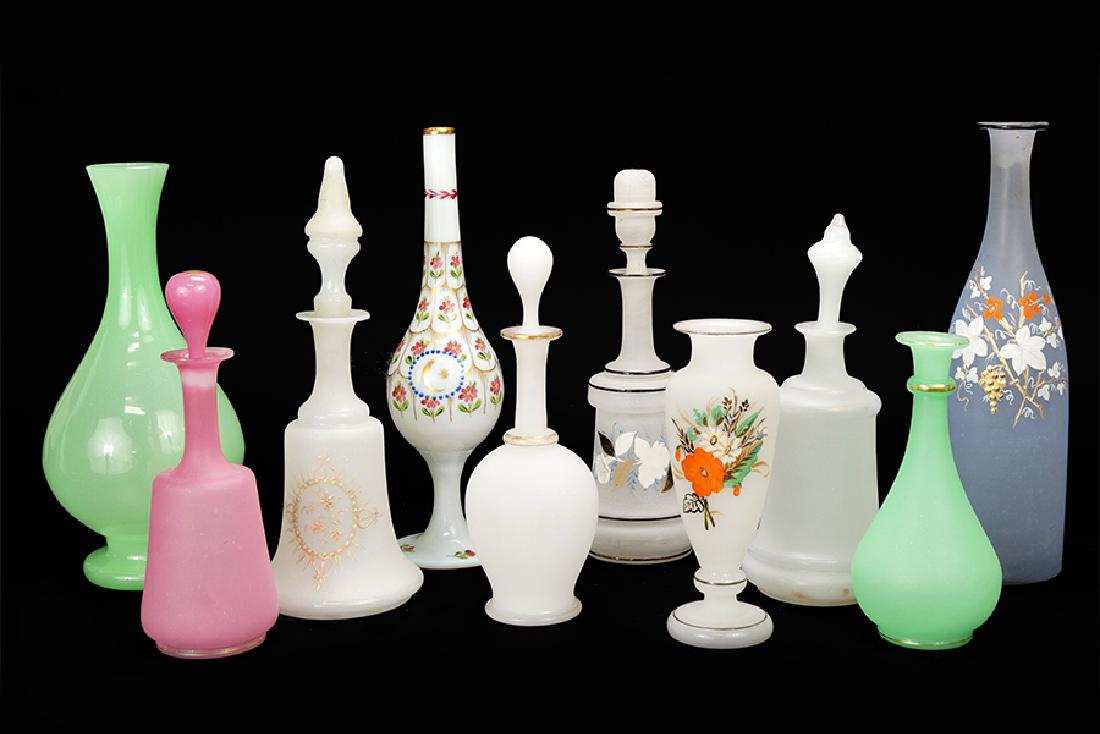 A Collection Of Five Glass Bottles.