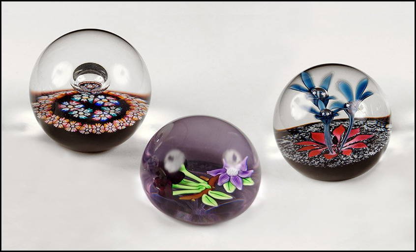Three Caithness Paperweights.