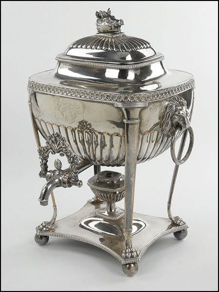 AN ENGLISH SILVER AND SILVERPLATE TEA URN. Height: 17"