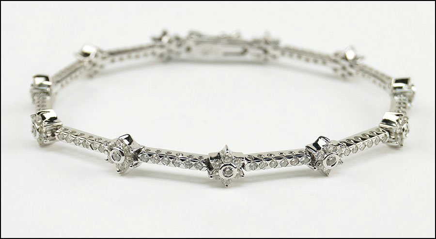 A Diamond And 18 Karat White Gold Bracelet Length 7
