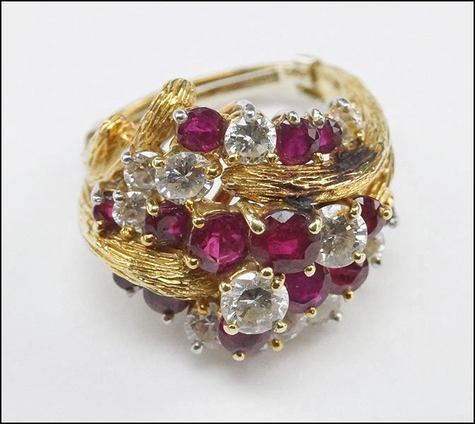 A RUBY AND DIAMOND COCKTAIL RING.