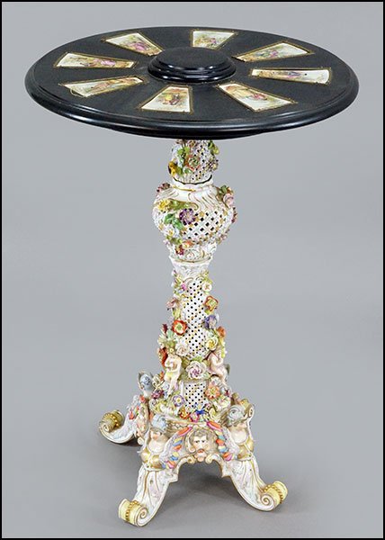 A 19TH CENTURY PORCELAIN TABLE.