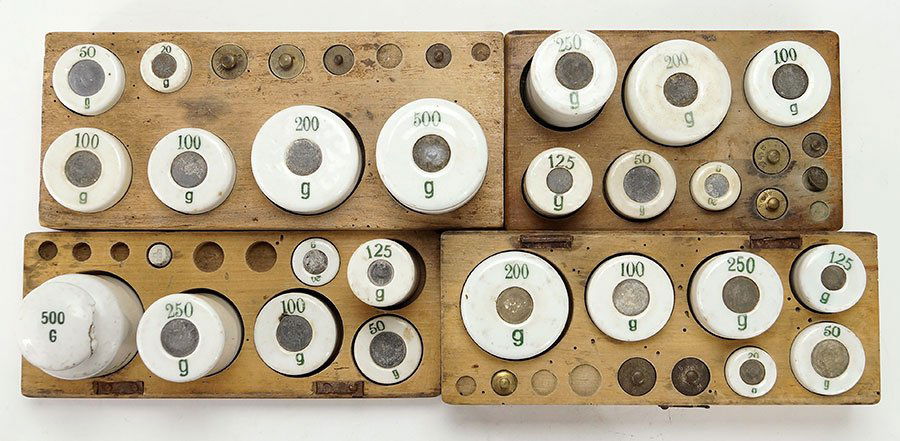 A Collection of Porcelain Ceramic Scale Weights.