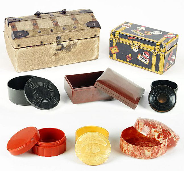 A Collection Of Bakelite Boxes.