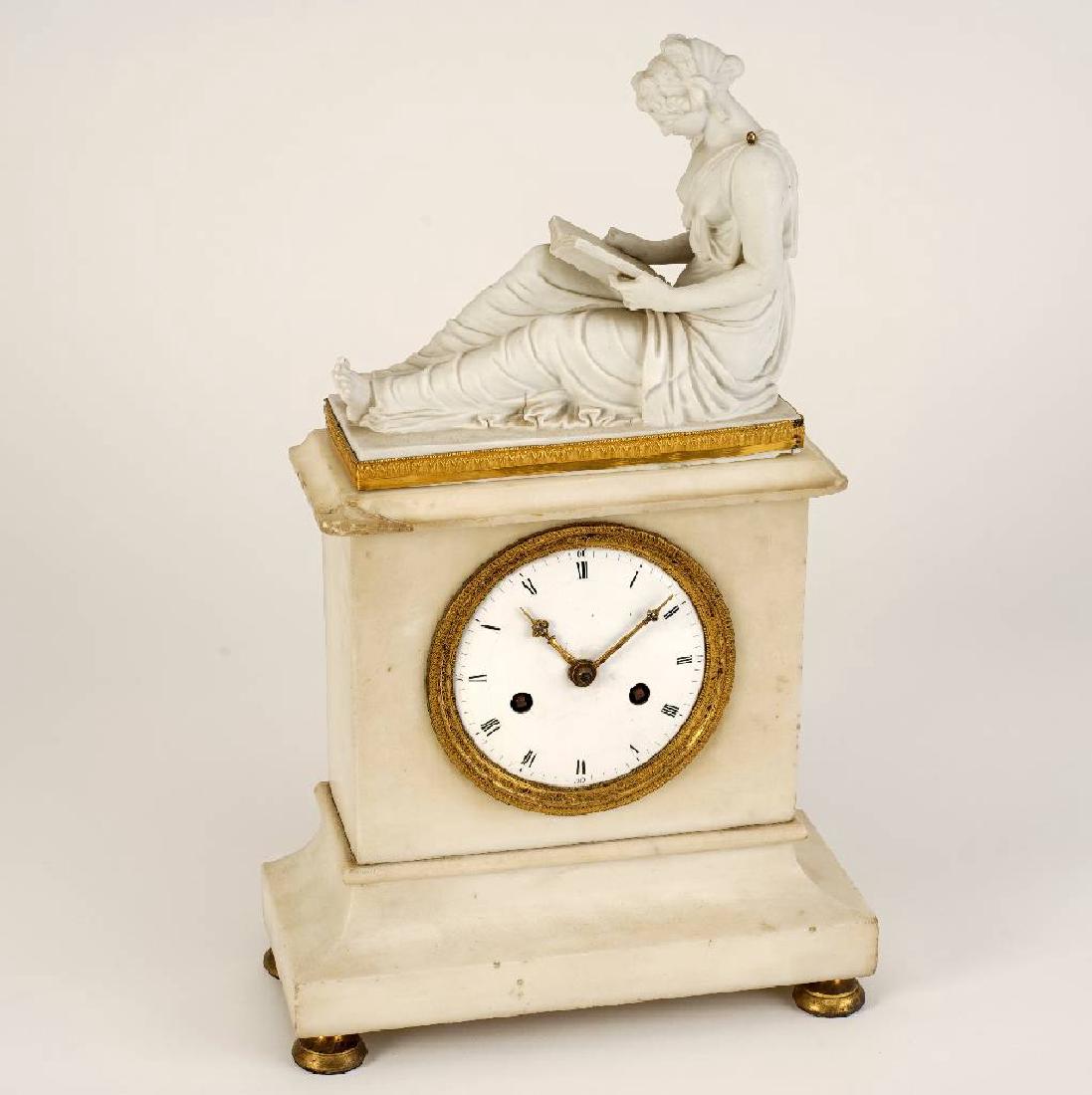 Table clock with figural representation