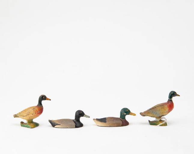 Four Painted Cast Iron Ducks