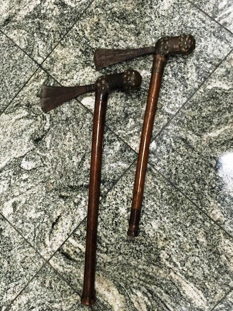 Pair Of Primitive Axe Form Clubs