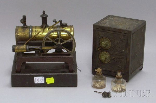 938: Steam Engine and Toy Bank, toy safe by the "Keyles