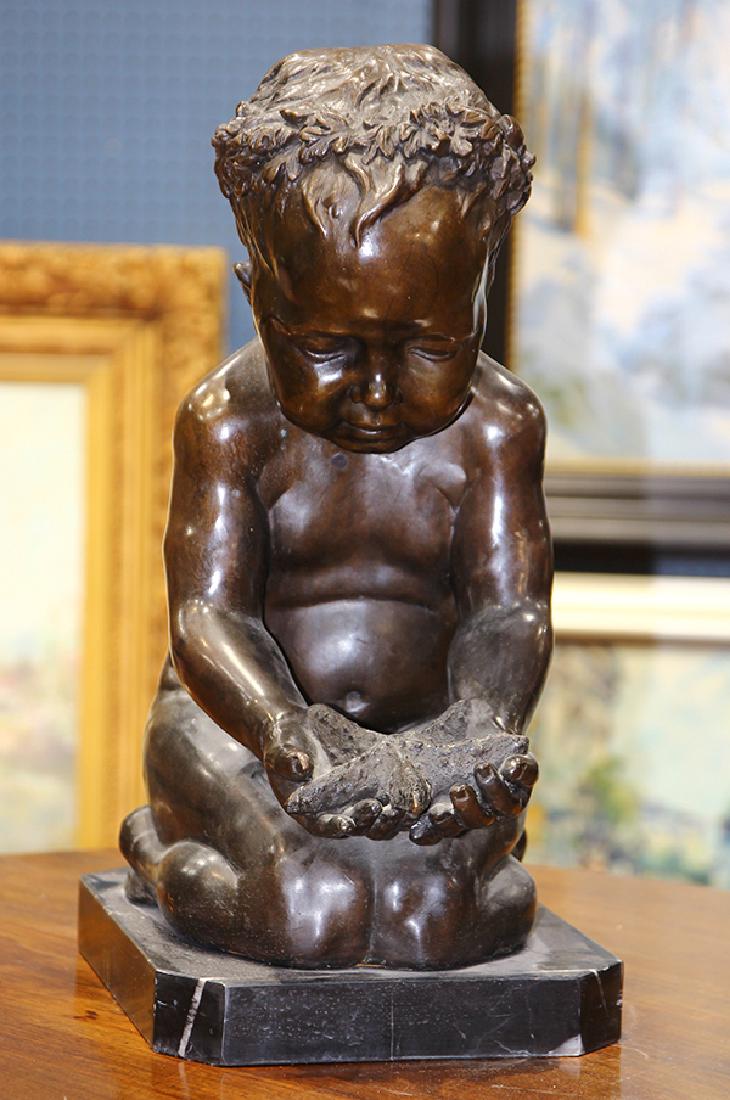 Rococo style patinated bronze figural sculpture of a