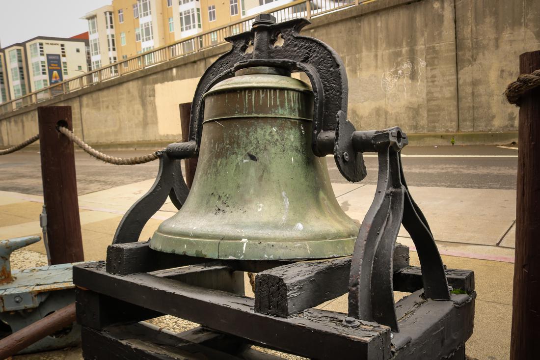 Large bronze bell on stand