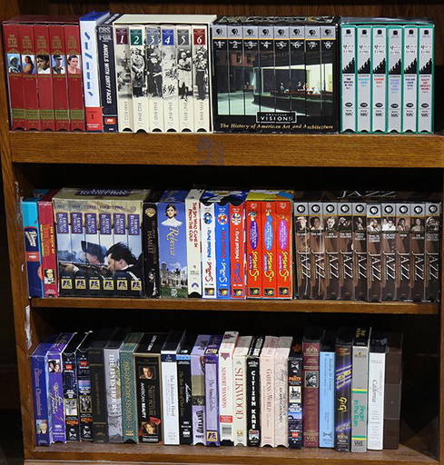Three Shelves Of Vhs Tapes Relating To American History
