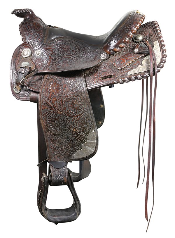 Silver mounted western show saddle