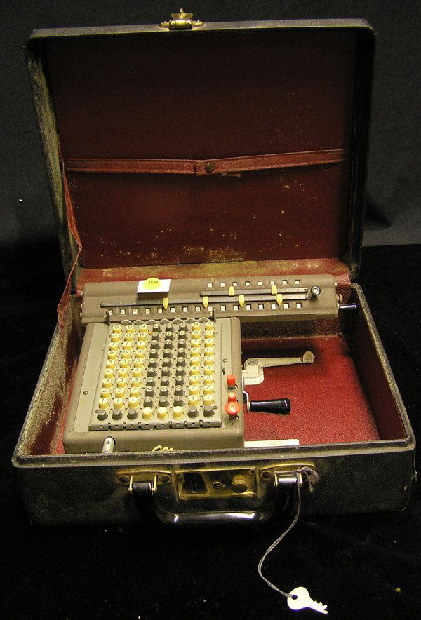 4501: Monroe hand crank calculator in case