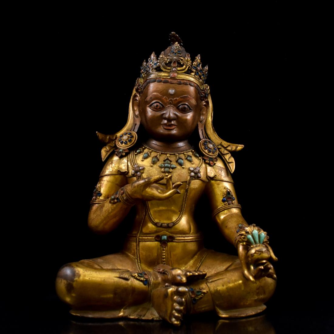 YUAN GILT BRONZE & STONES INLAID YELLOW JAMBHALA BUDDHA