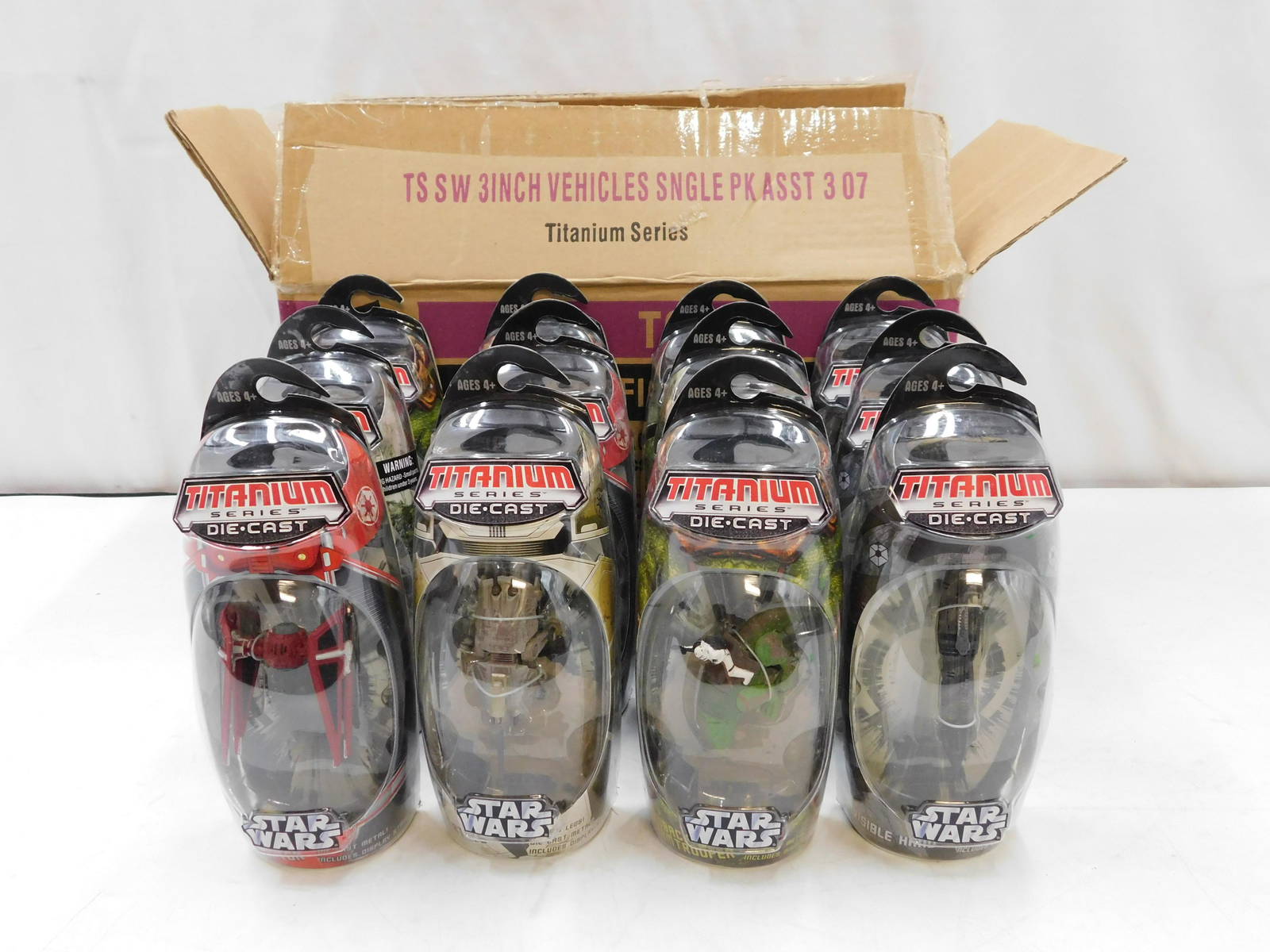 Full Case Of 12 Star Wars Titanium Vehicles Auction