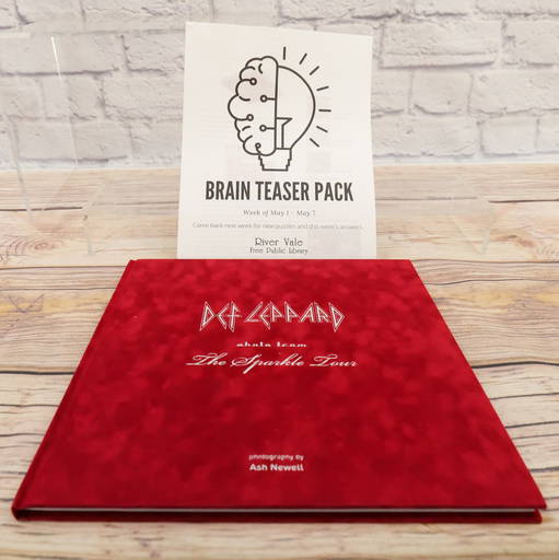 Def Leppard Autographed Hardcover Book