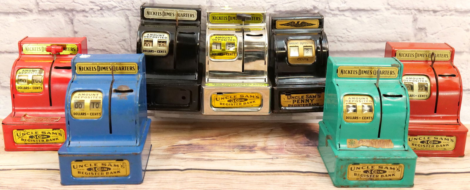 Lot Of 7 Tin Plated Uncle Sam's 3 Coin Register Banks Auction