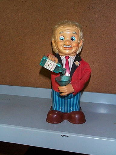 Battery Operated Toy Man Drinking Scotch Whiskey.