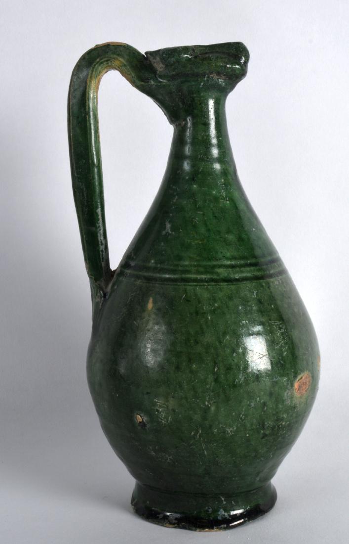 A Persian Green Glazed Jug 9th/10th Century, With High
