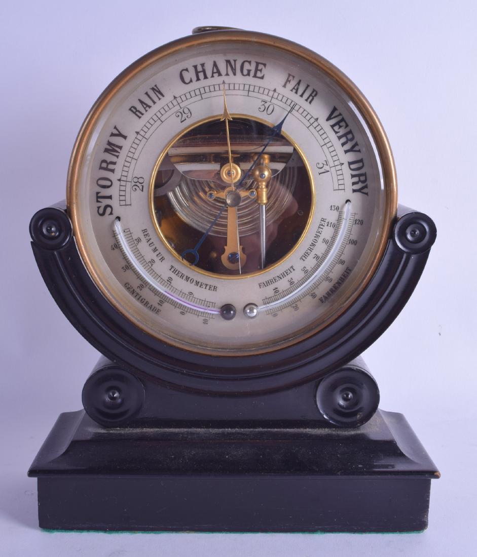 A STYLISH ANTIQUE BRASS OPEN WORK BAROMETER with