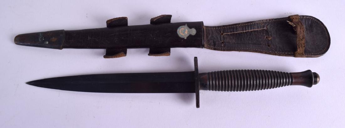A MILITARY COMMANDO DAGGER. 30 cm long.