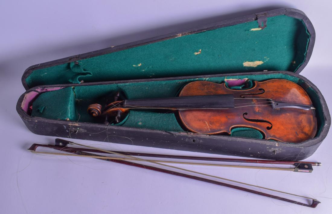 A CASED TWO PIECE BACK VIOLIN with two bows. 56 cm