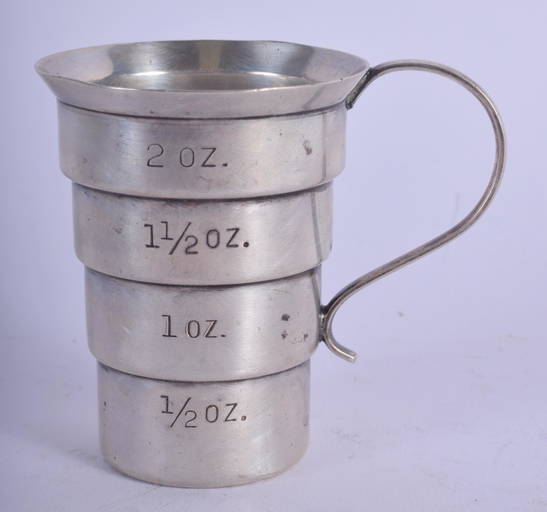 A Sterling Silver Measuring Cup. 2 Oz. 6.75 Cm High.