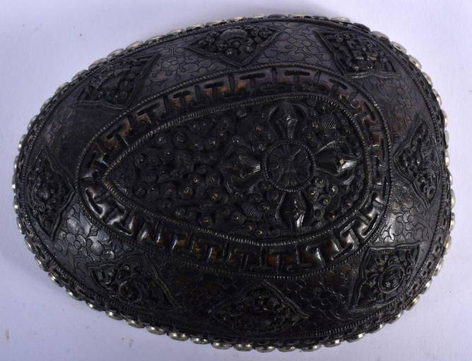 An Unusual Antique Tibetan White Metal Mounted Bone